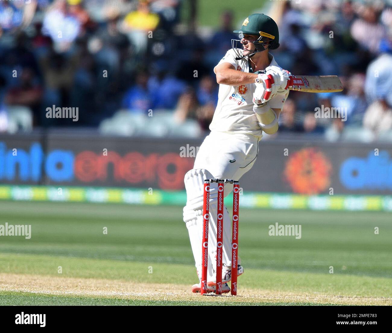 Australia's Joe Burns plays at a high delivery from India on the third ...