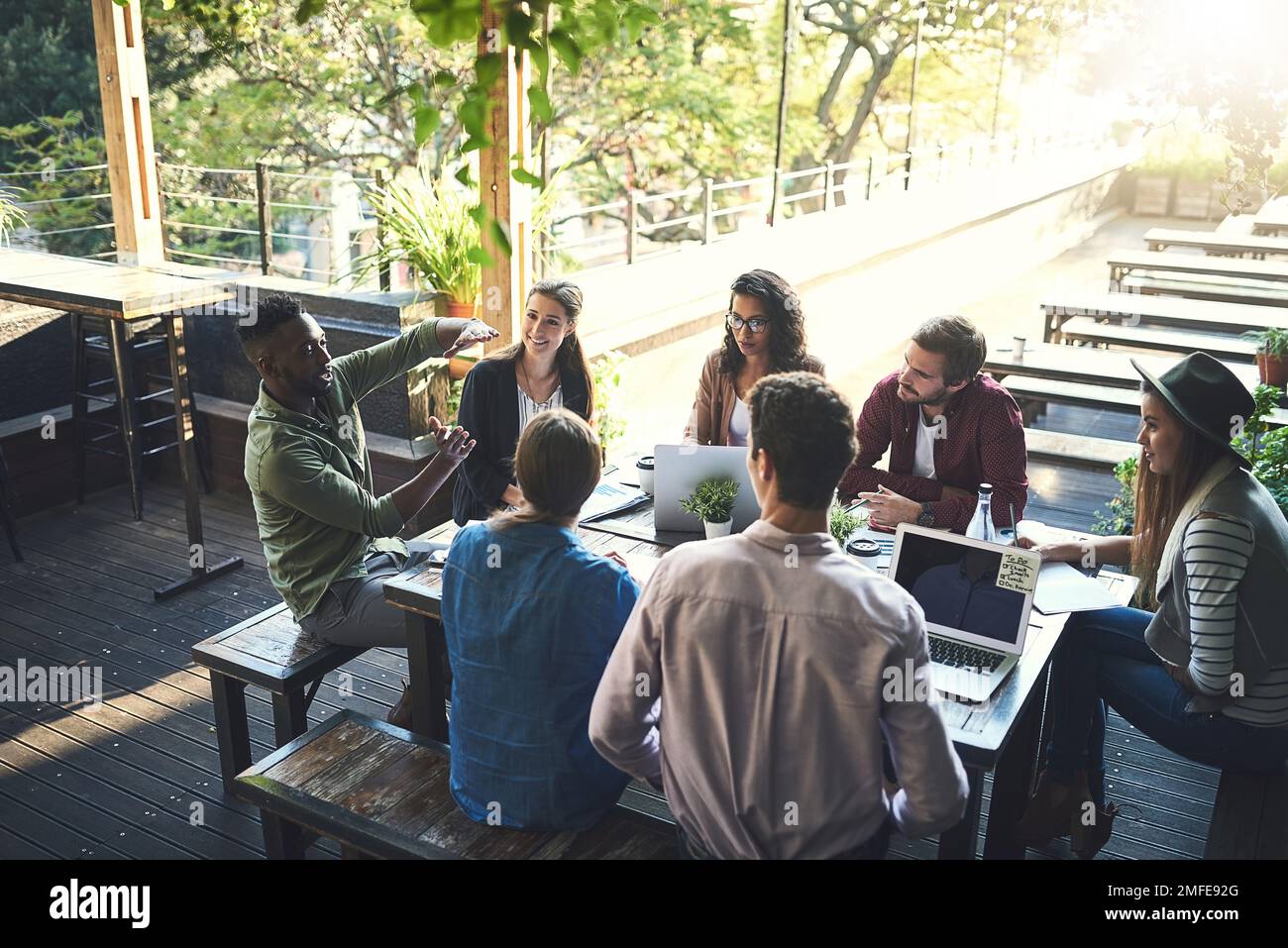 Its the perfect spot to host a casual business meeting. a group of ...