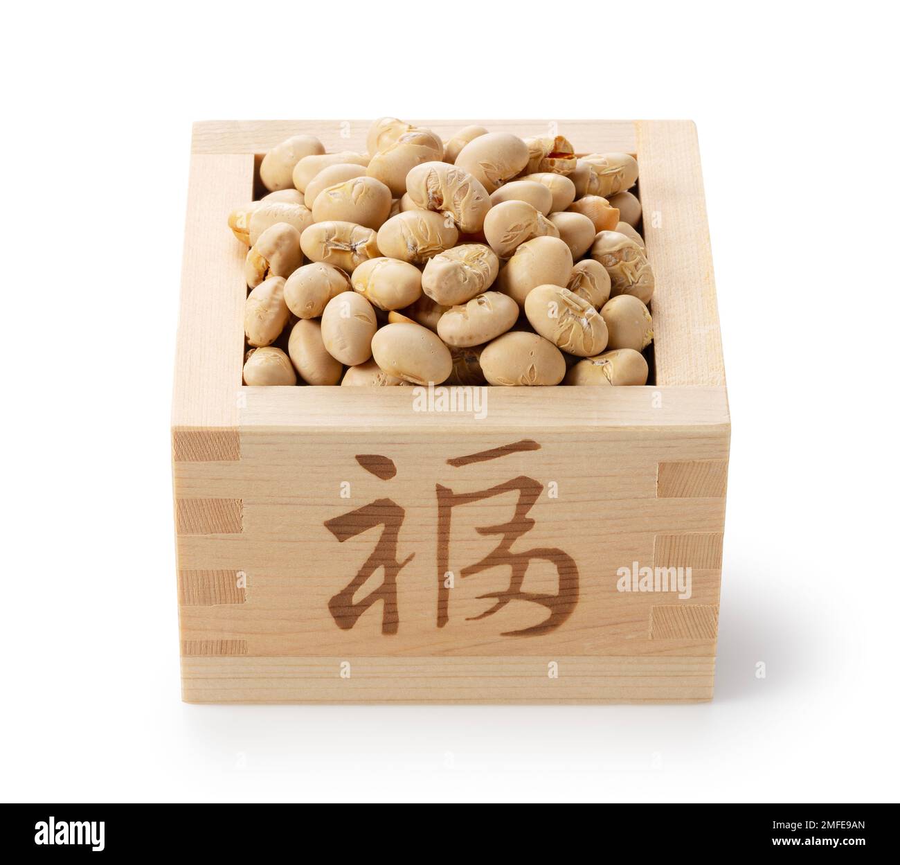 A wooden "fukumame" (lucky beans) bowl set against a white background ...