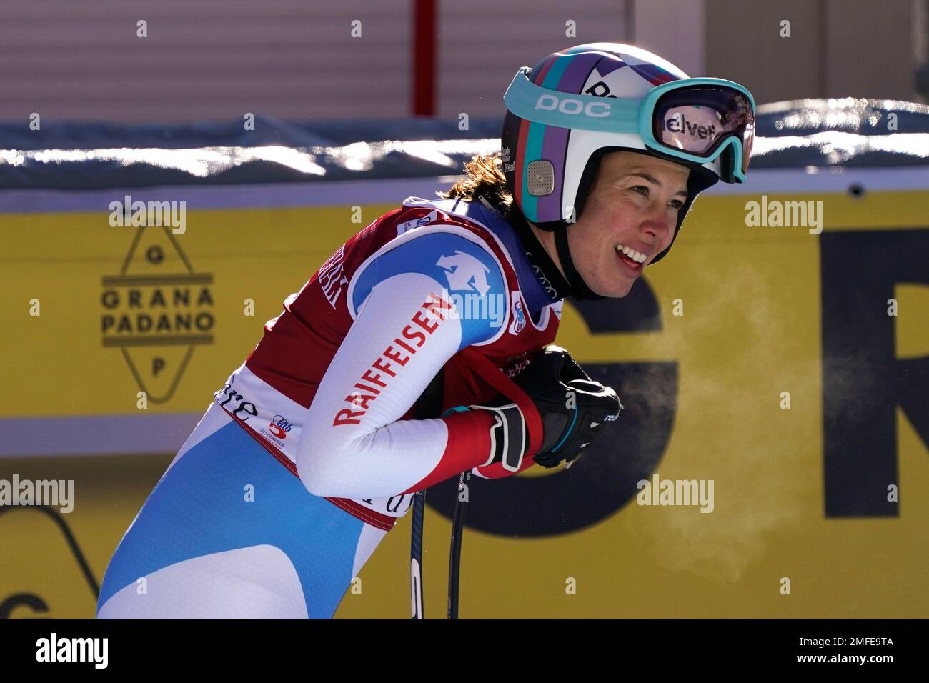 Switzerland's Michelle Gisin smiles after crossing the finish line ...
