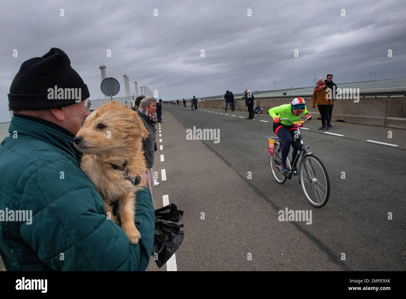 A competitor battles gale force winds during the Dutch Headwind Cycling ...