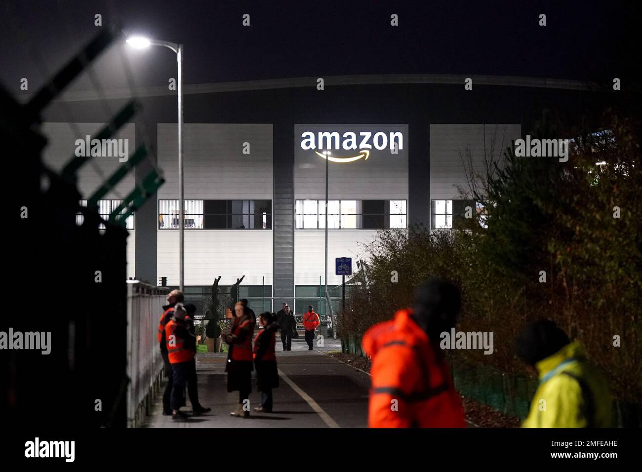 Members of the Amazon security keep an eye on members of the GMB union ...
