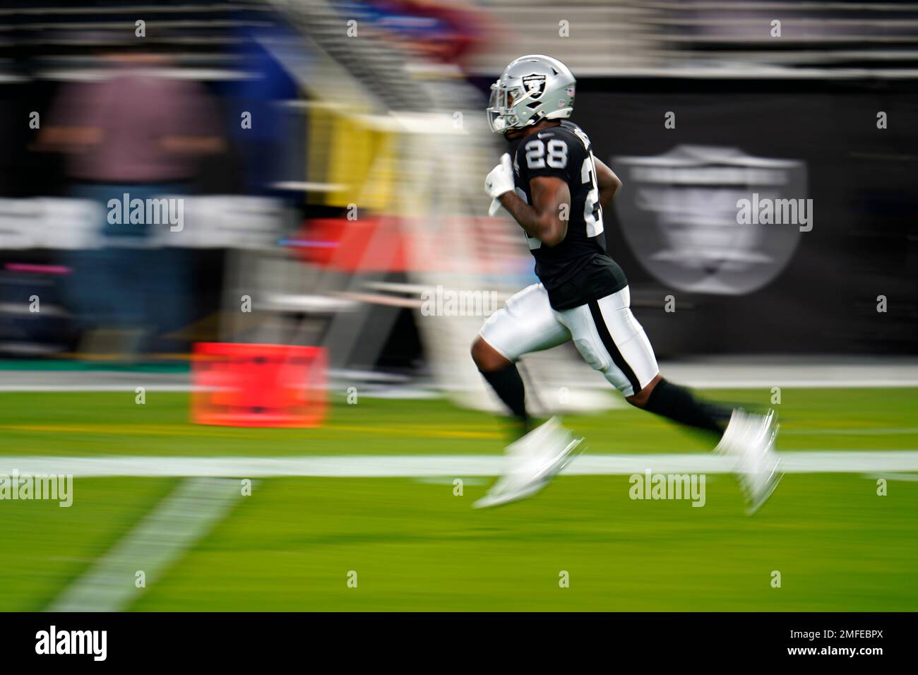 Las Vegas Raiders running back Josh Jacobs #28 warms up prior to ...