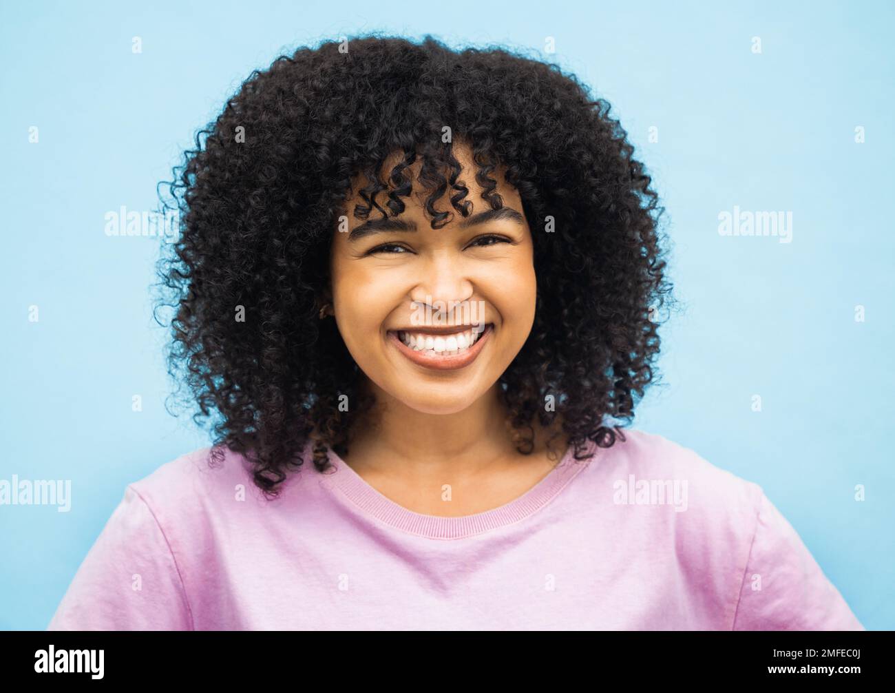 Fashion, smile and portrait of black woman on blue background with ...