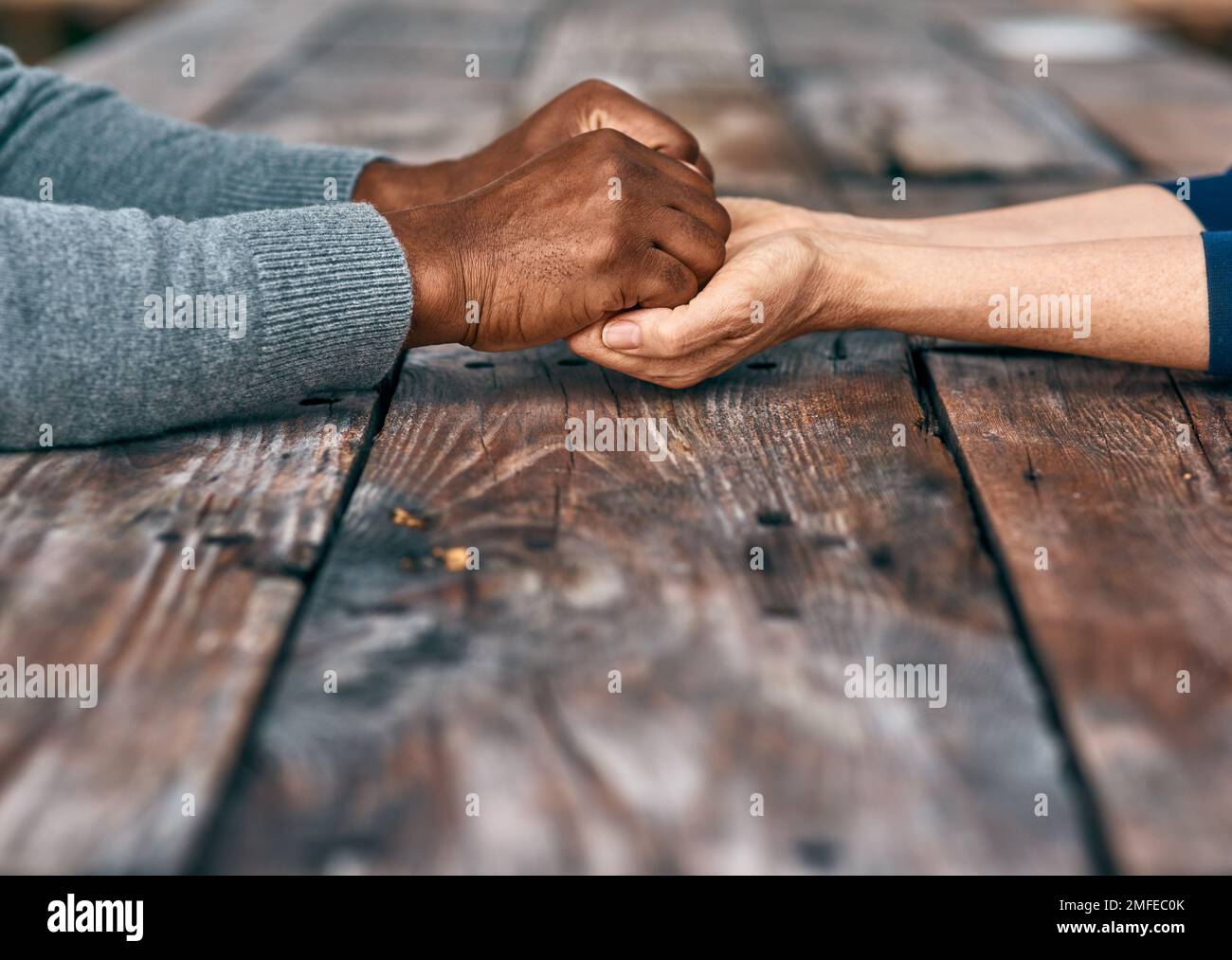 Never let go of what sets you free. two unrecognizable people holding ...