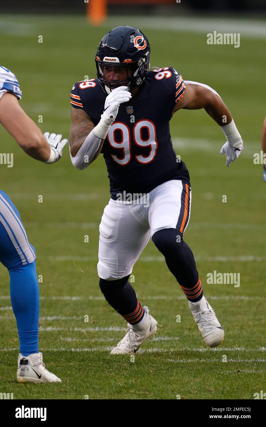 Chicago Bears linebacker Trevis Gipson (99) rushes in against the Detroit Lions during an NFL ...