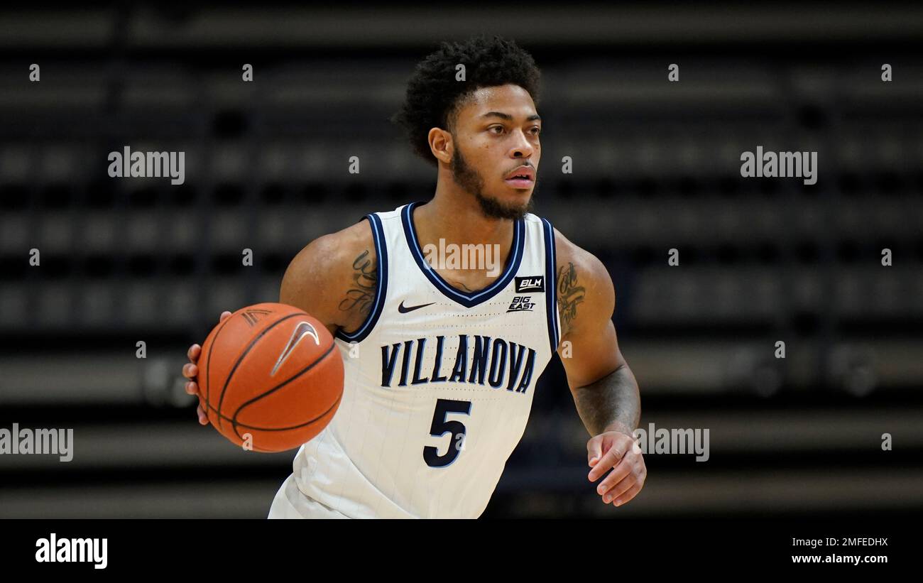 Villanova's Justin Moore plays during an NCAA college basketball game ...