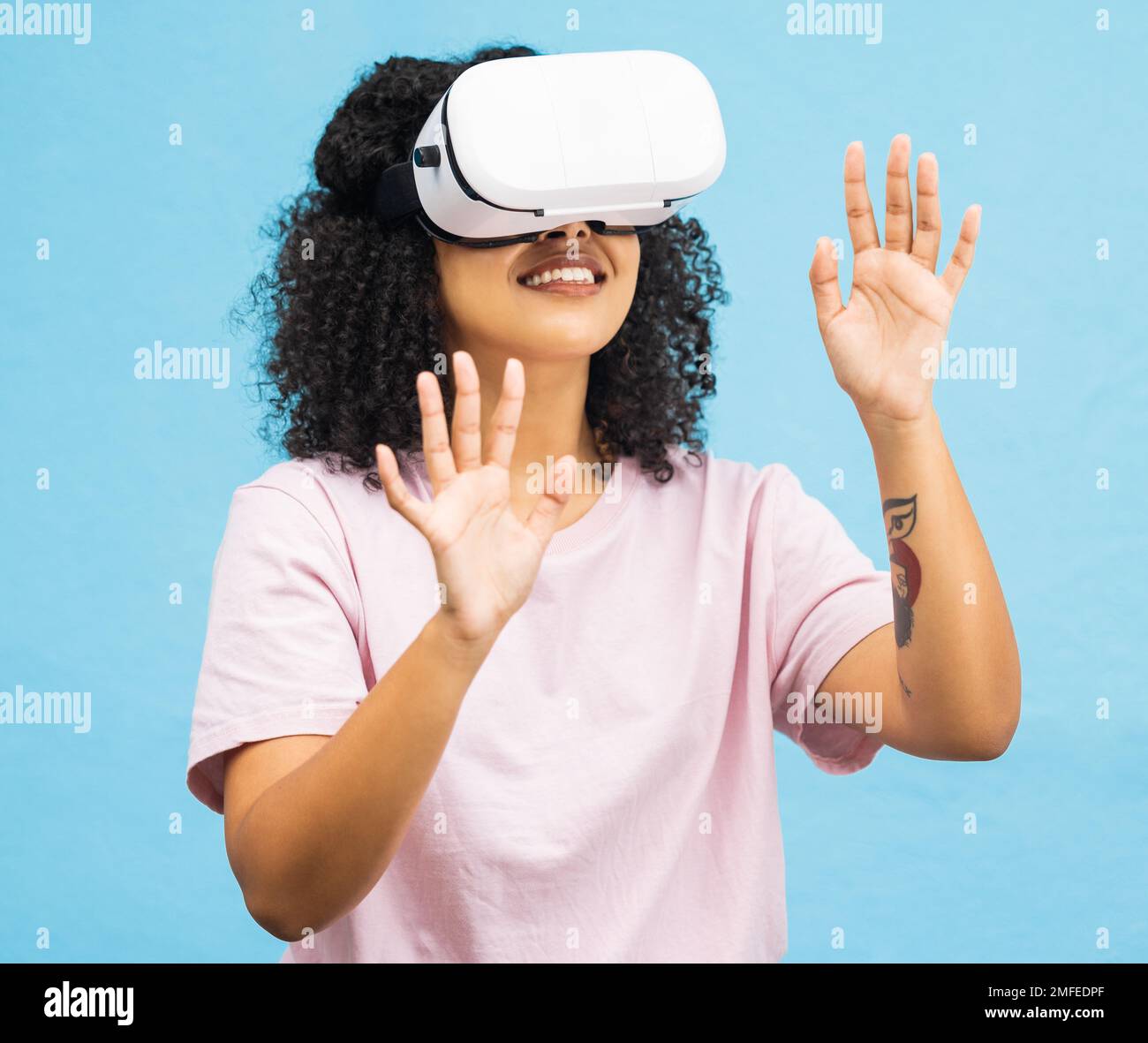 Black woman with virtual reality glasses, happy with hands in metaverse, VR and futuristic tech ...