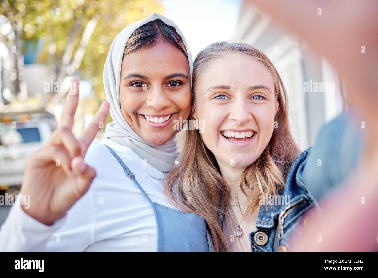 Selfie, peace sign and couple of friends with social media post ...