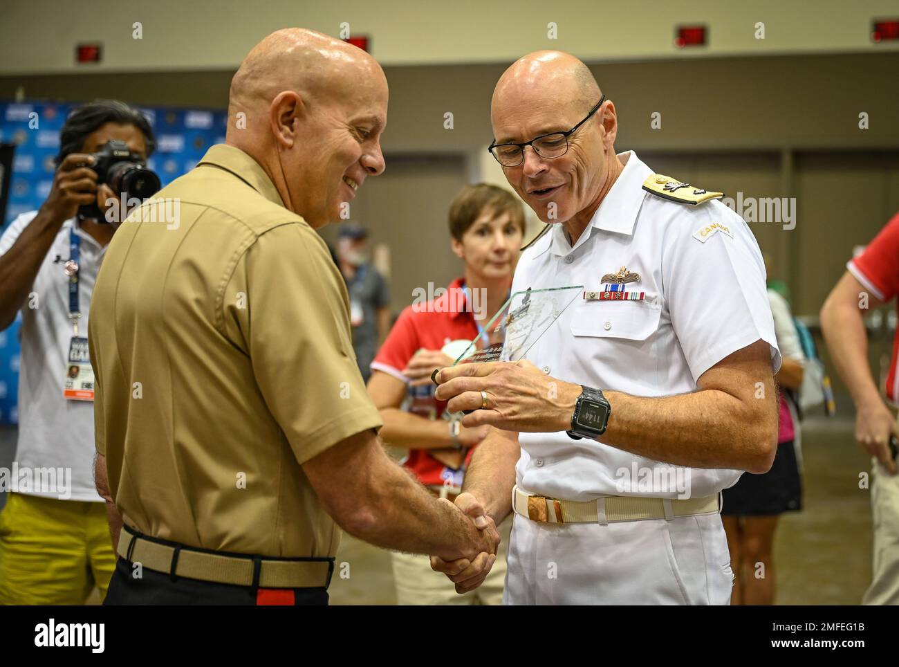 Commandant of the Marine Corps, General David H. Berger receives a gift ...