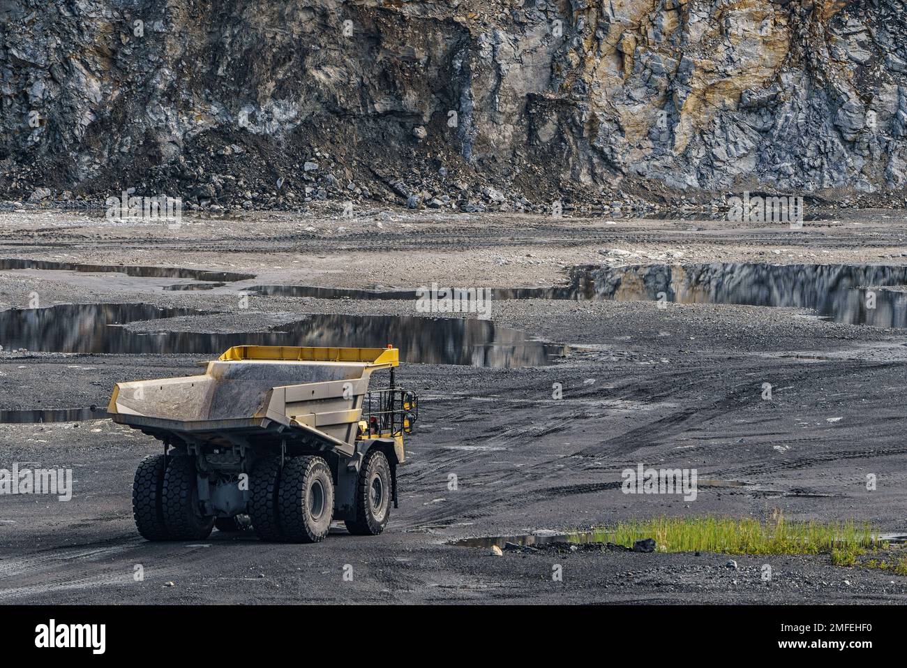 Dump truck in limestone mining, heavy machinery. Mining in the quarry ...
