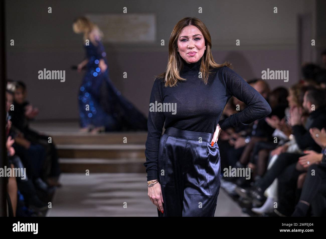 Lebanese fashion designer Hind Zeidan greets the audience at the end of ...