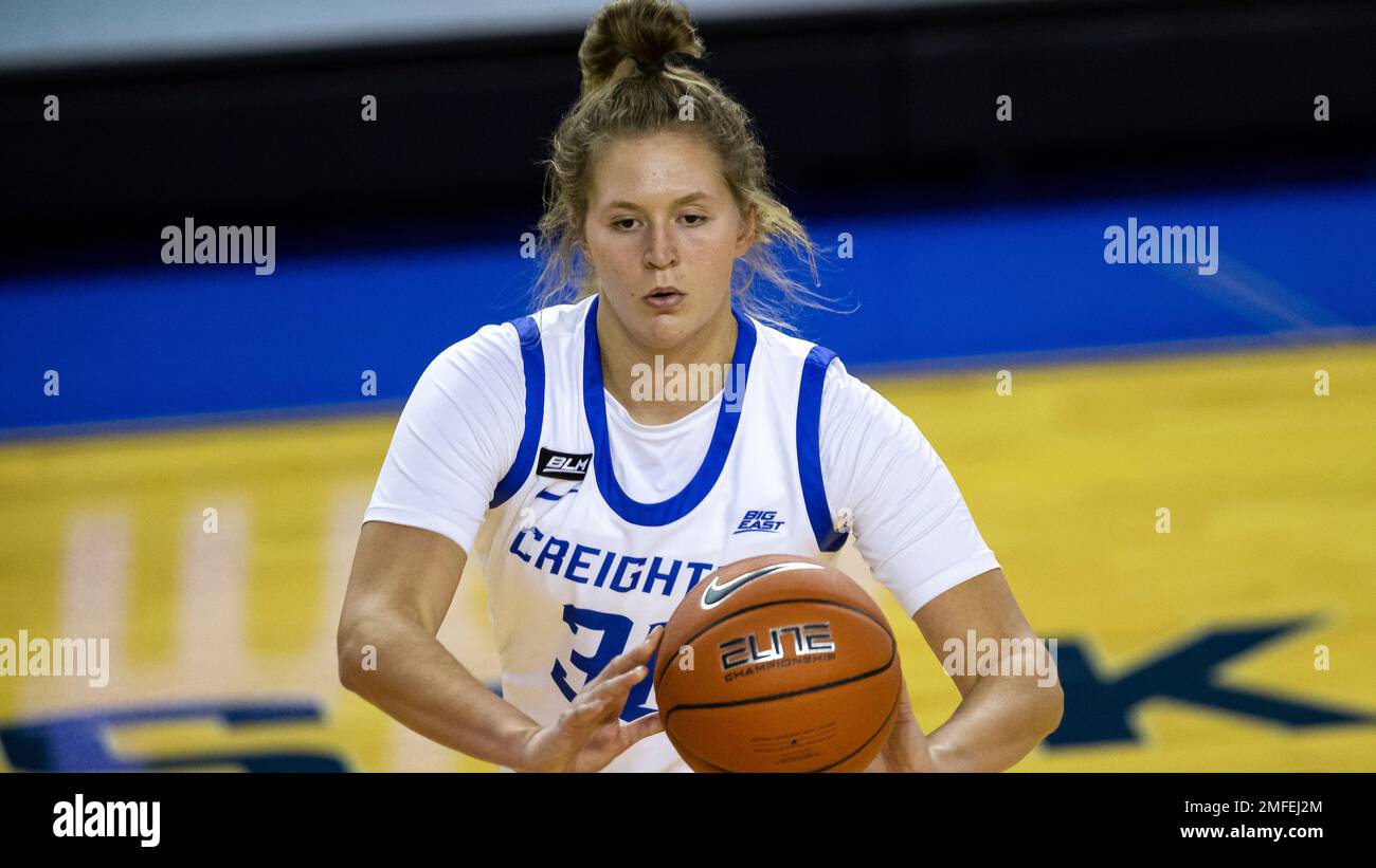 Creighton guard Morgan Maly (30) passing the ball against Nebraska ...