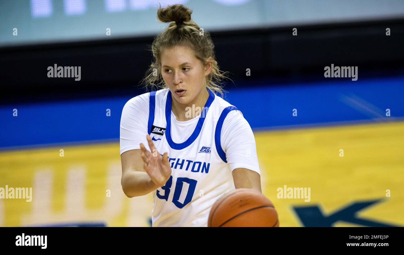 Creighton guard Morgan Maly (30) passing the ball against Nebraska ...