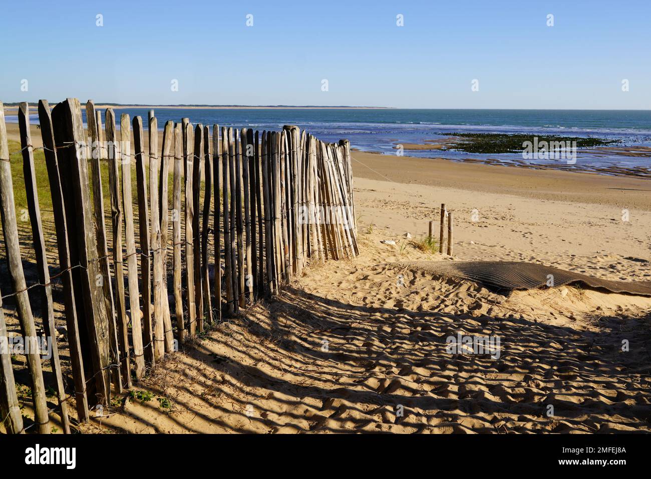 sandy beach fence pathway to protect dune and access water sea Stock ...