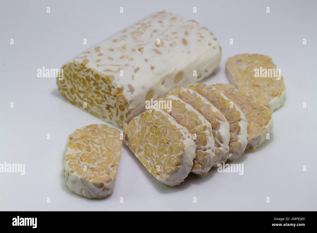 Tempe or Tempeh is a Indonesian traditional food made of fermented soya ...