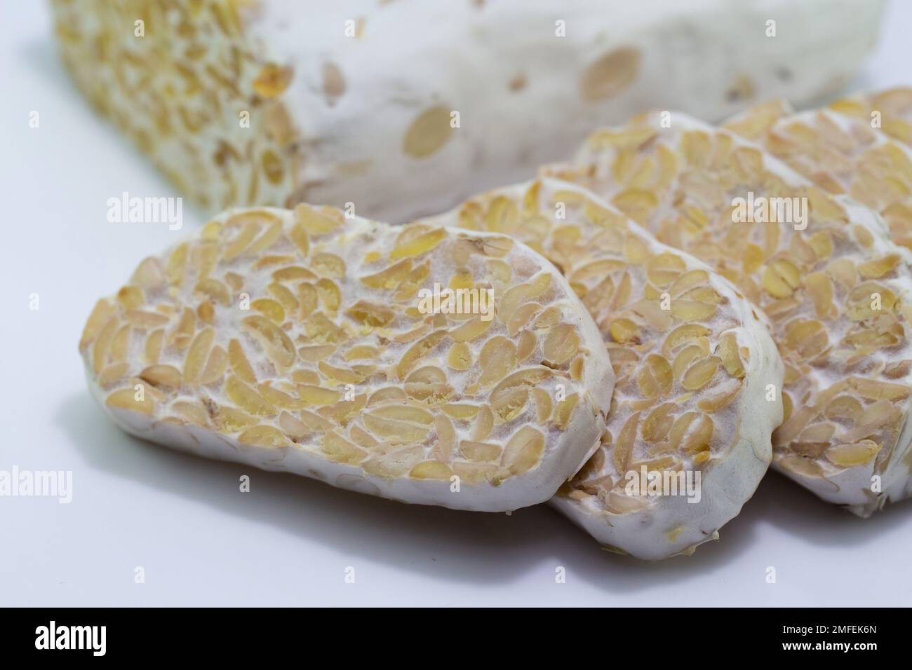 Tempe or Tempeh is a Indonesian traditional food made of fermented soya ...