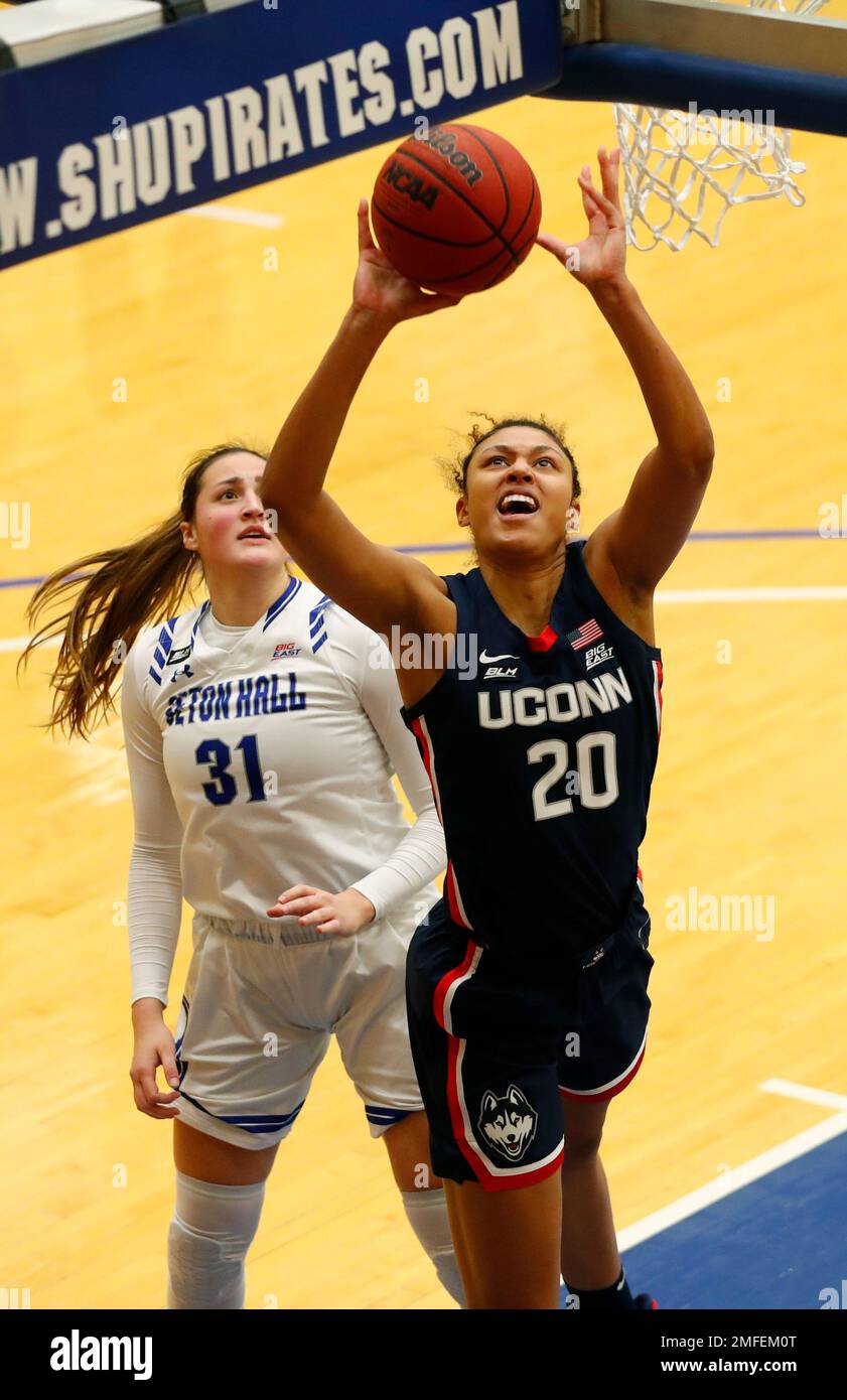 UConn forward Olivia Nelson-Ododa (20) goes to the basket against Seton ...