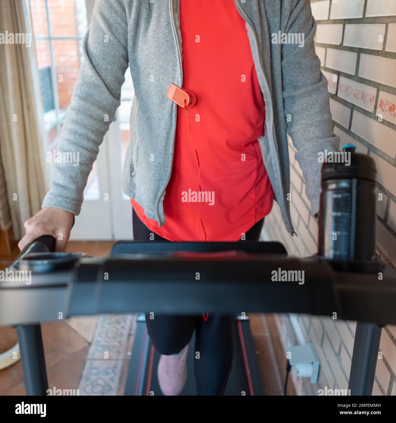 Mature woman running on treadmill hi-res stock photography and images ...