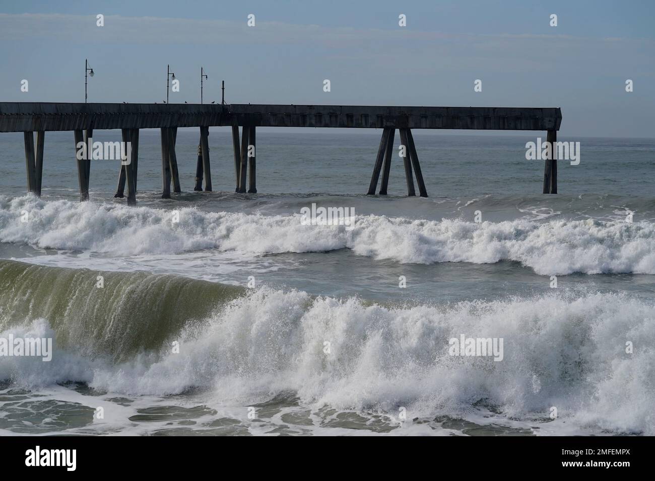Waves roll past the Pacifica Pier in Pacifica, Calif., Tuesday, Dec. 15 ...