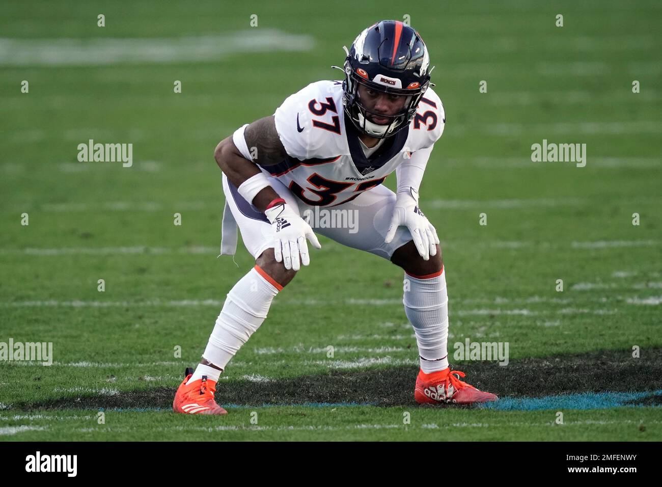Denver Broncos safety P.J. Locke (37) lines up against the Carolina ...