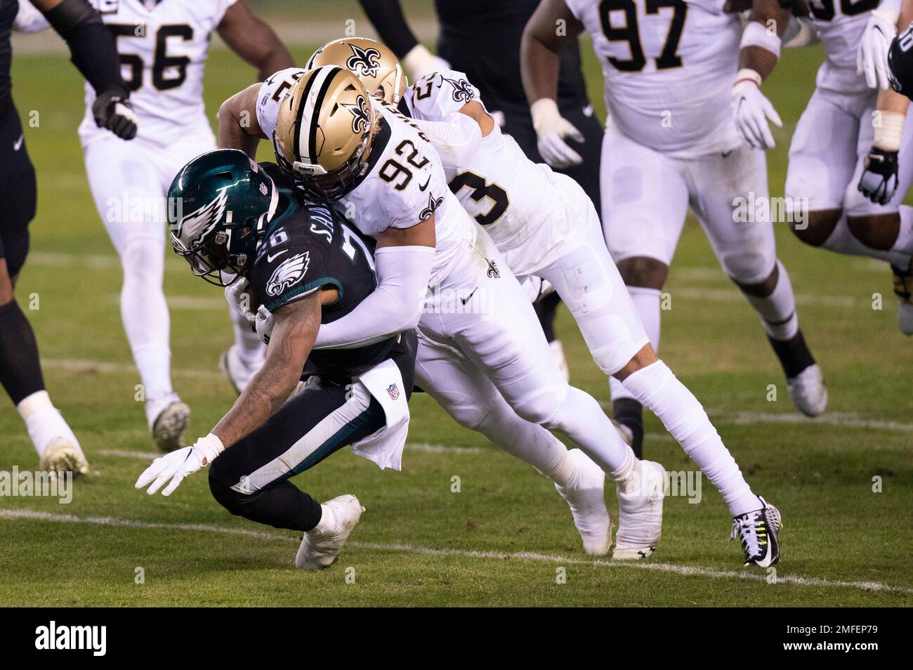 New Orleans Saints defensive end Marcus Davenport (92) takes down ...