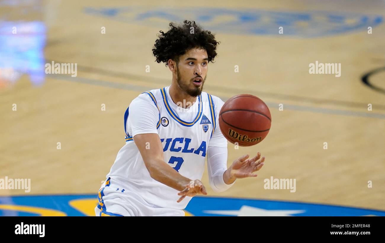 UCLA guard Johnny Juzang (3) makes a pass during an NCAA college ...