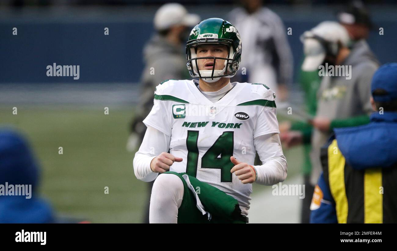 New York Jets quarterback Sam Darnold looks on from the sidelines ...