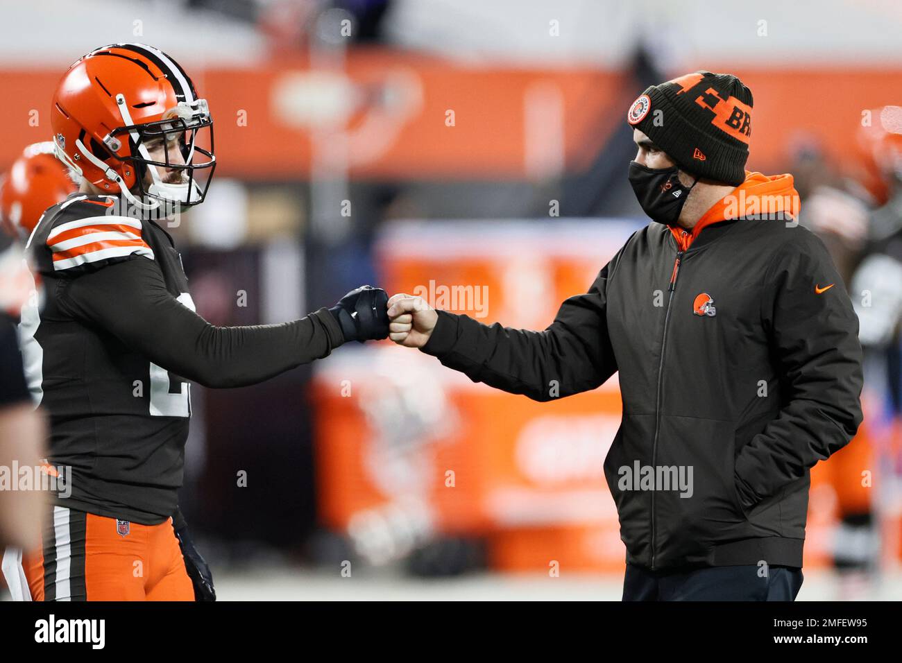 Cleveland Browns head coach Kevin Stefanski, right, fist-bumps strong ...