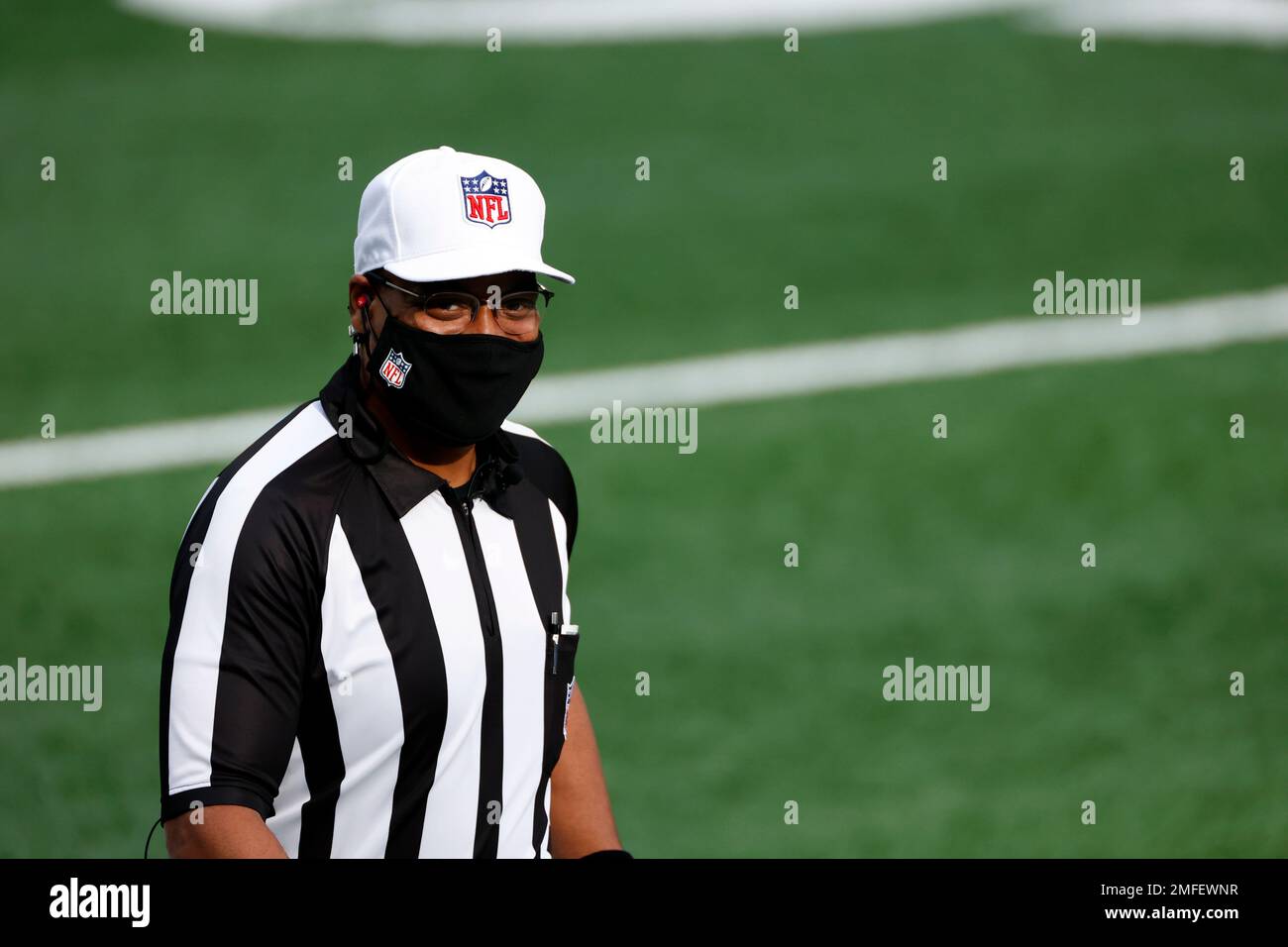 Referee Ron Torbert (62) looks on before an NFL football game between ...