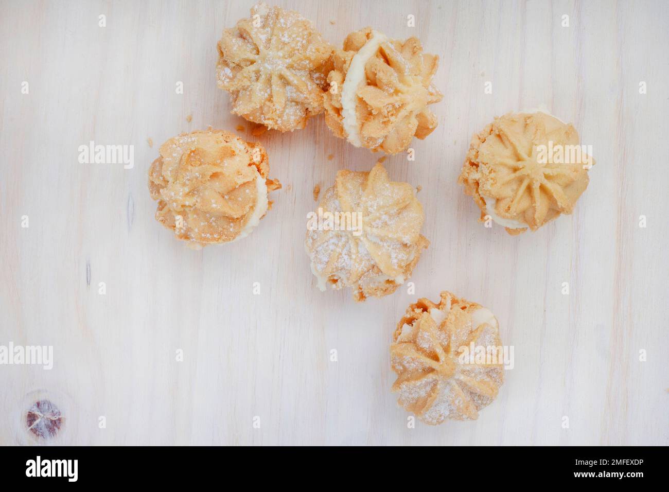 homemade melting moment or yo-yo biscuits in corner with copy space on ...