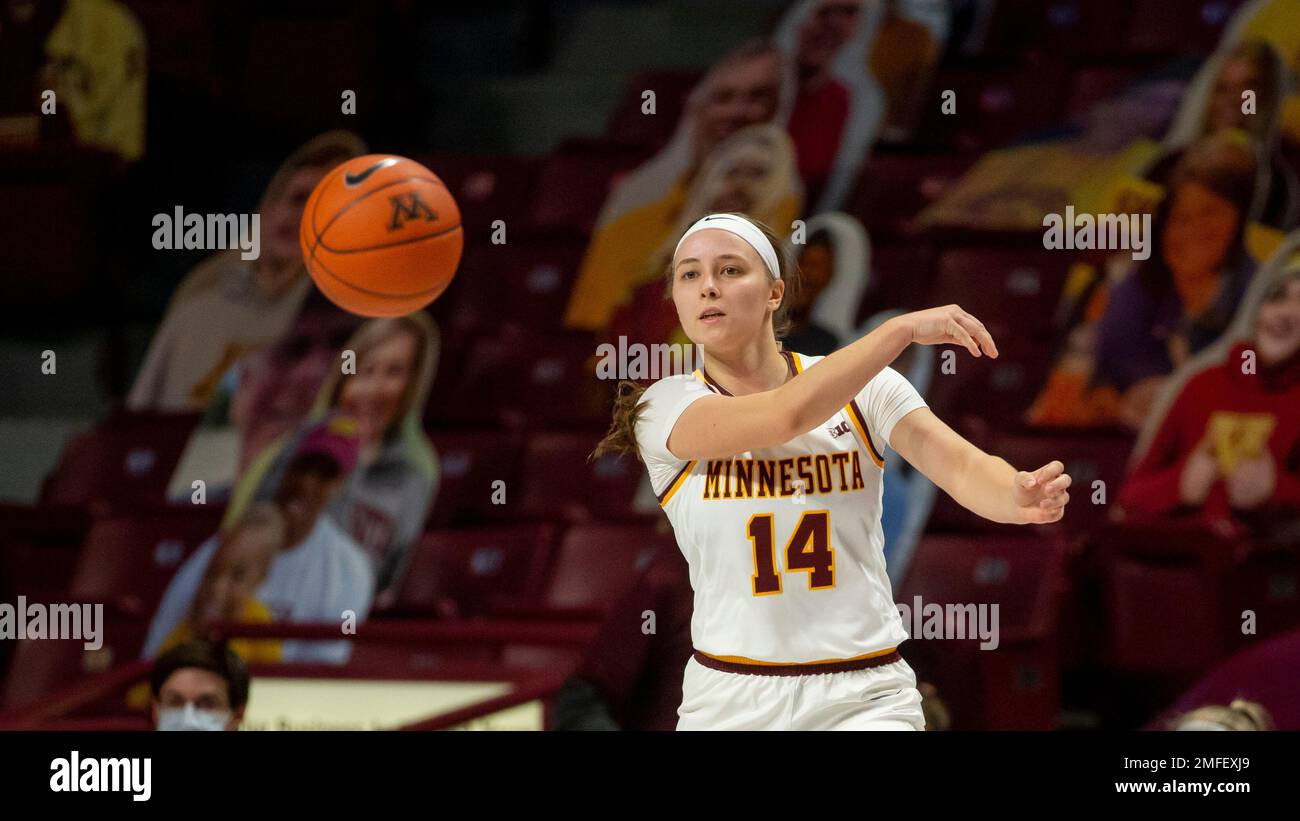 Minnesota guard Sara Scalia passes the ball up court against Michigan ...