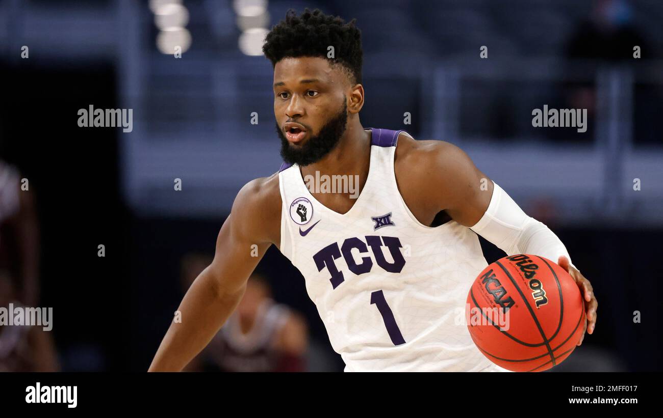 TCU guard Mike Miles (1) brings the ball up court against Texas A&M ...