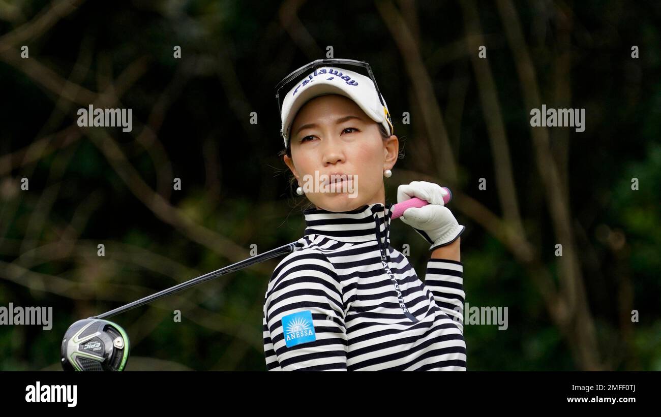 Momoko Ueda, of Japan, watches hers drive off the ninth tee during the ...