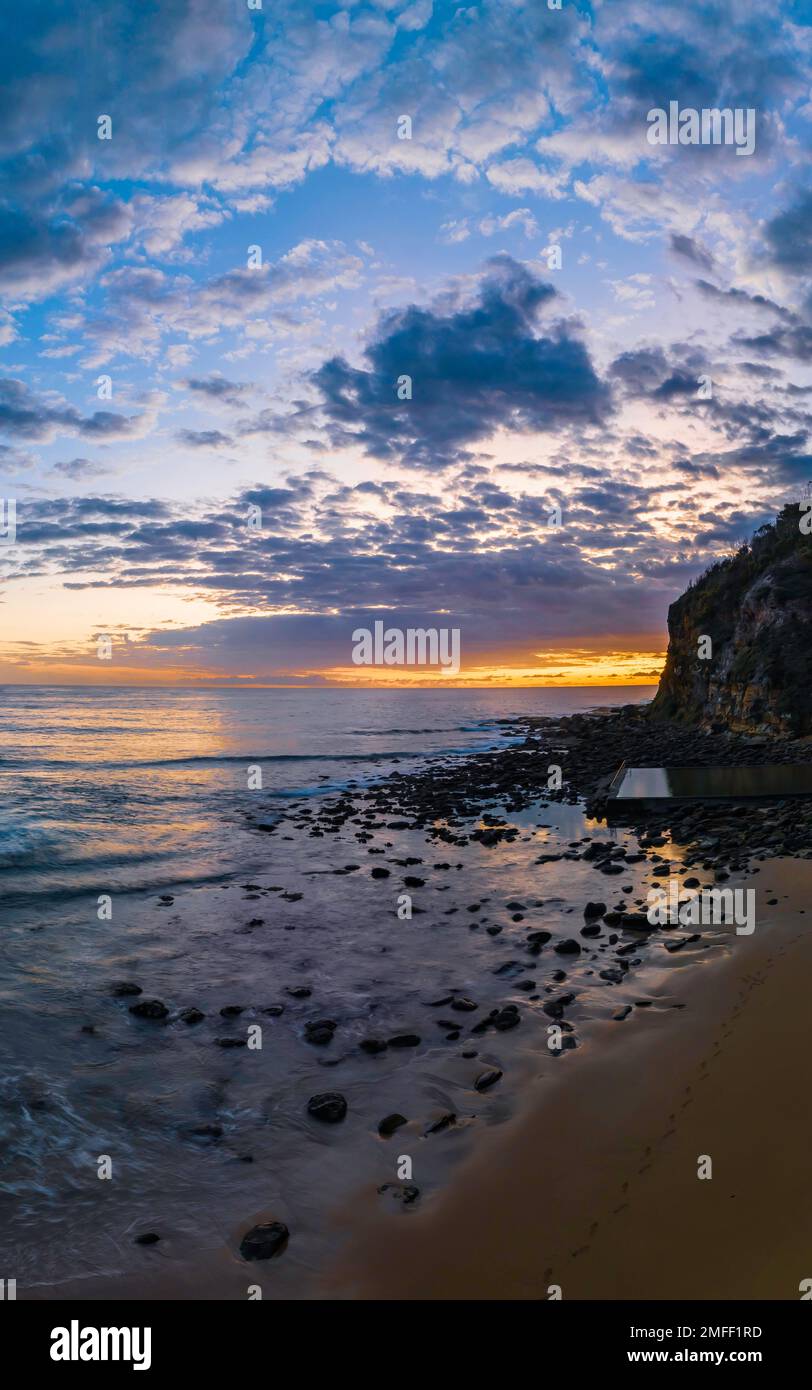 Aerial sunrise seascape with clouds at Macmasters Beach on the Central ...