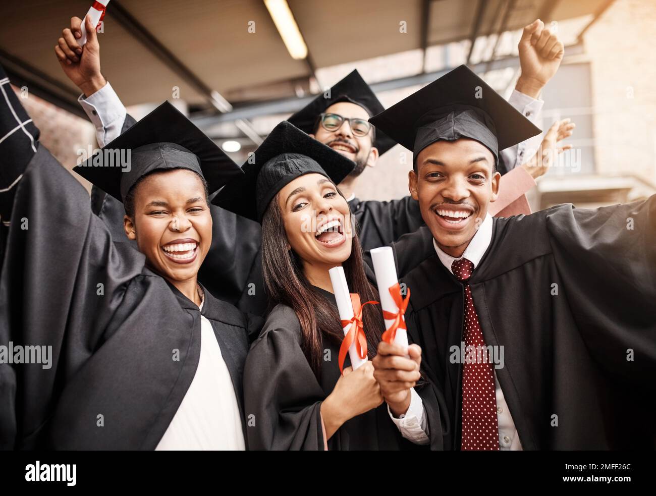 Theyve worked hard for this. Portrait of students on graduation day ...