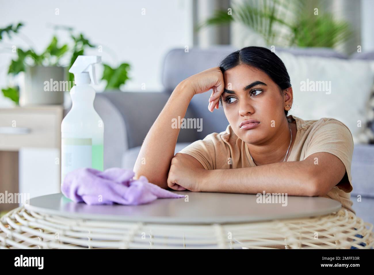 Tired unhappy cleaning lady sitting hi-res stock photography and images ...