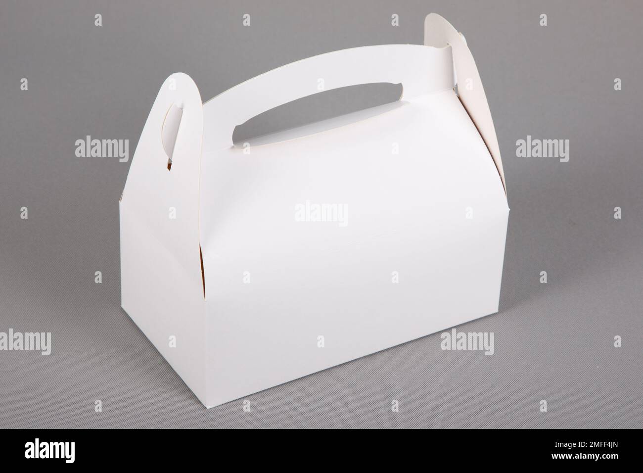 White blank empty mockup paper pastries candies box with handle in grey ...