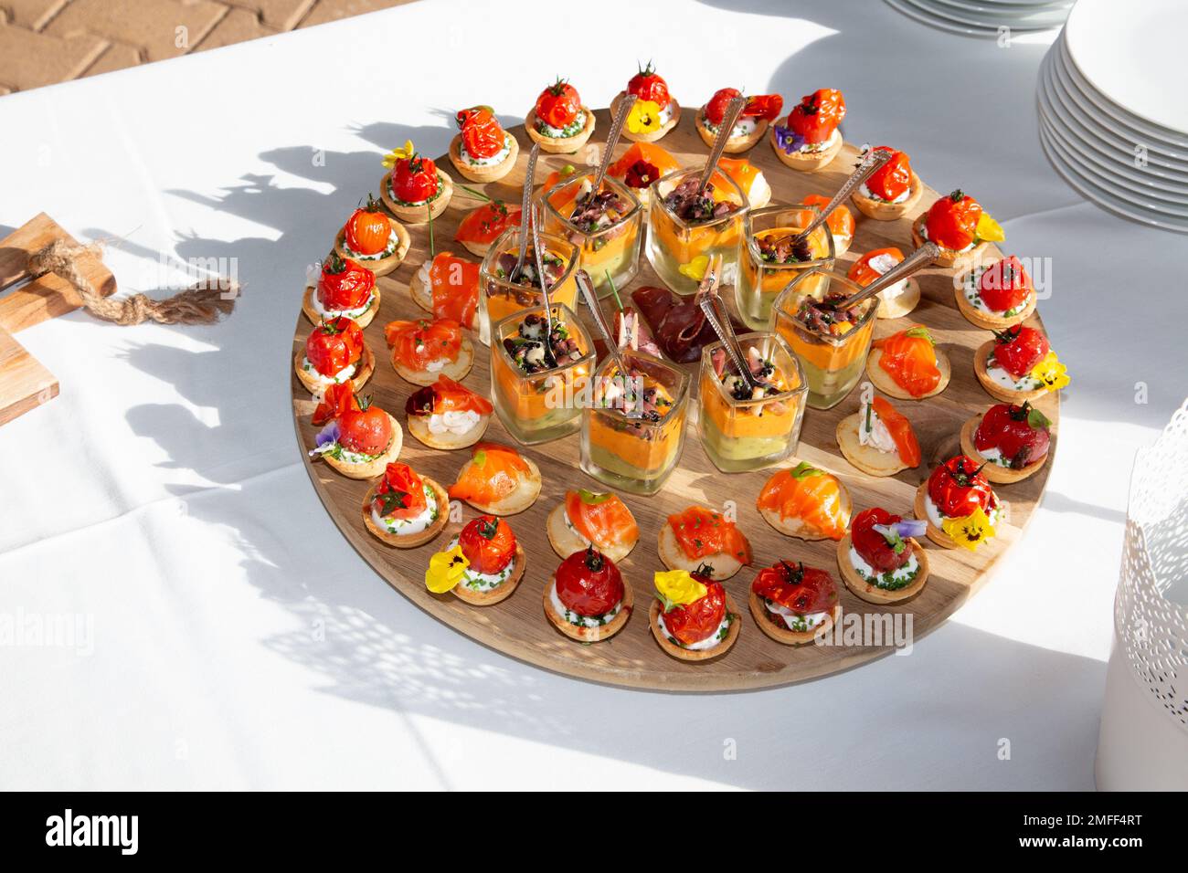 Cocktails toasts petits fours in white outdoor table in event party ...