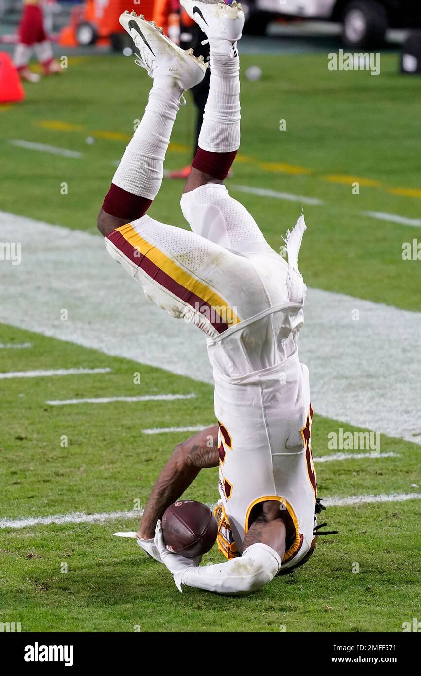 Washington Football Team strong safety Kamren Curl (31) runs back an ...