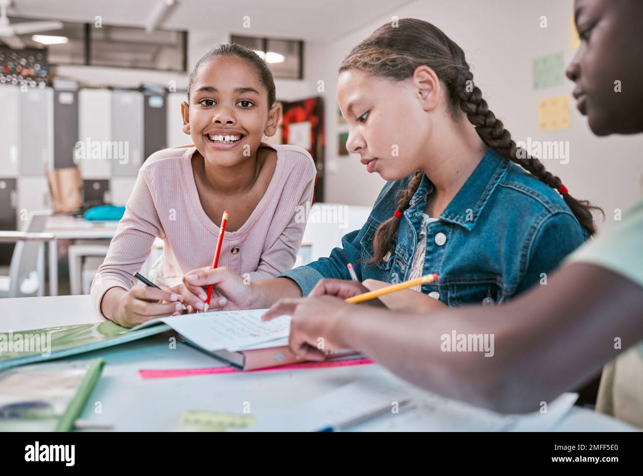 Education, students and portrait of girl in classroom with friends ...