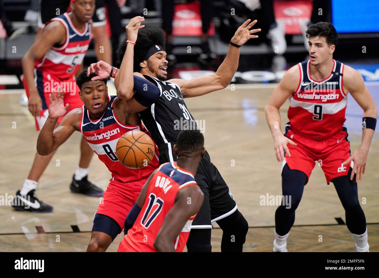 Washington Wizards forward Rui Hachimura (8) fouls Brooklyn Nets center ...