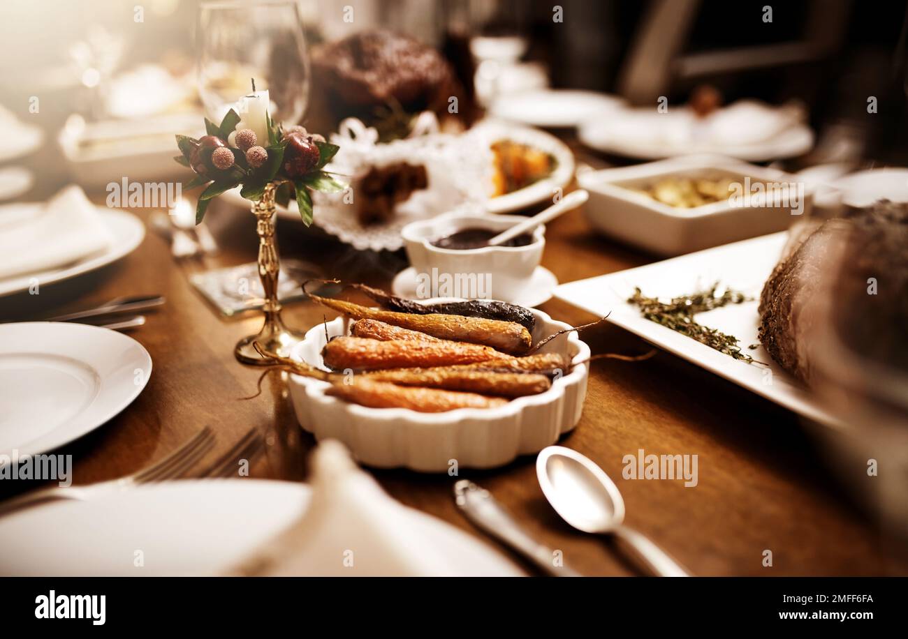 The perfect side dish for a Christmas feast. a feast on a table at ...