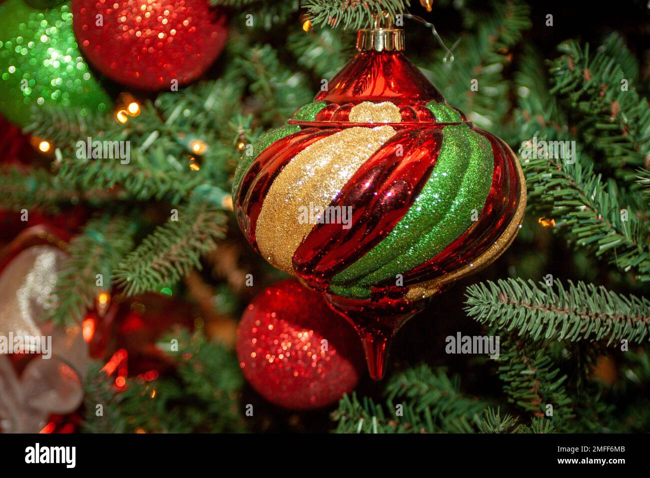 Glittery Christmas Ornament on a tree Stock Photo - Alamy