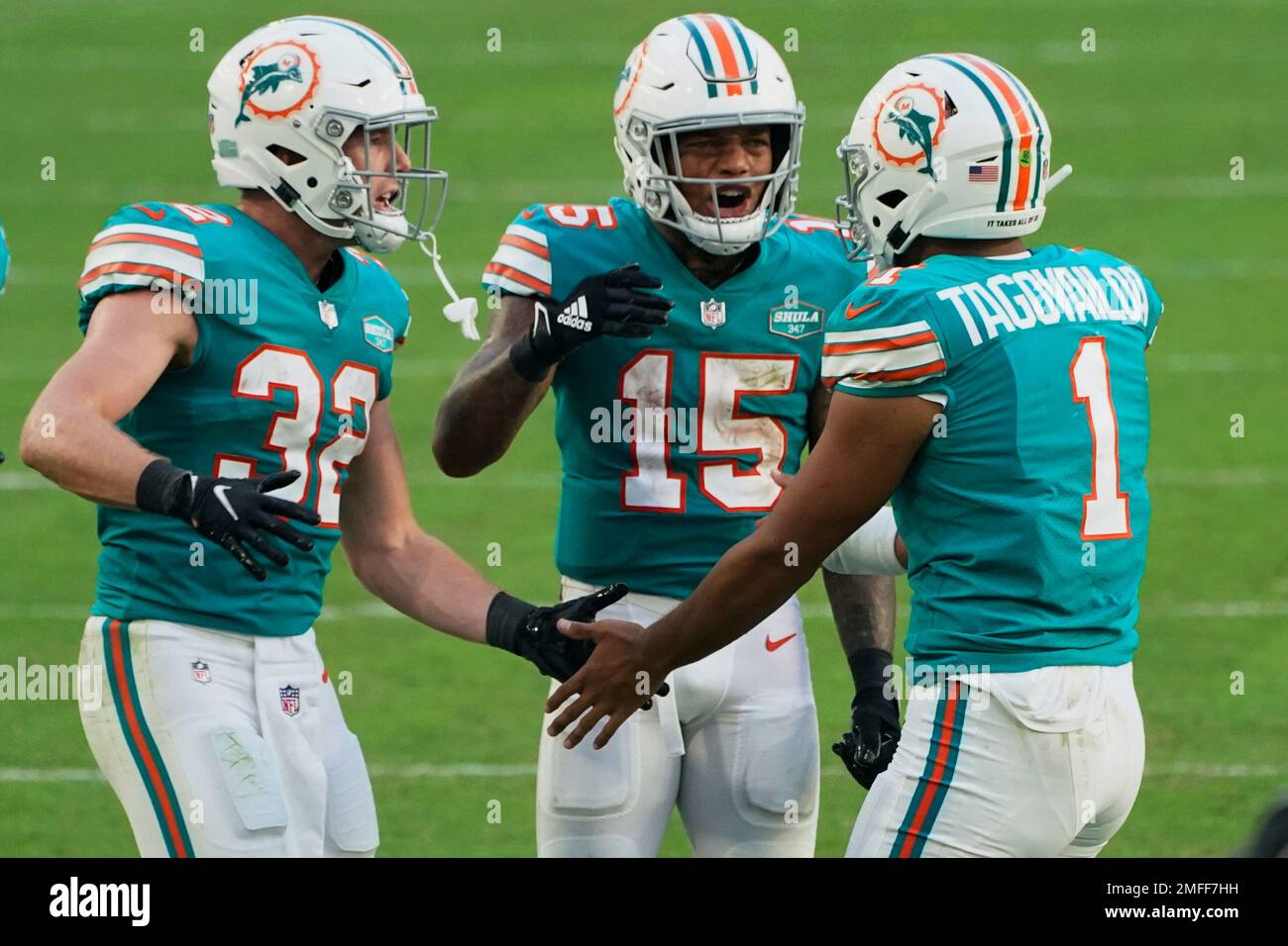 Miami Dolphins running backs Patrick Laird (32) and Lynn Bowden (15 ...