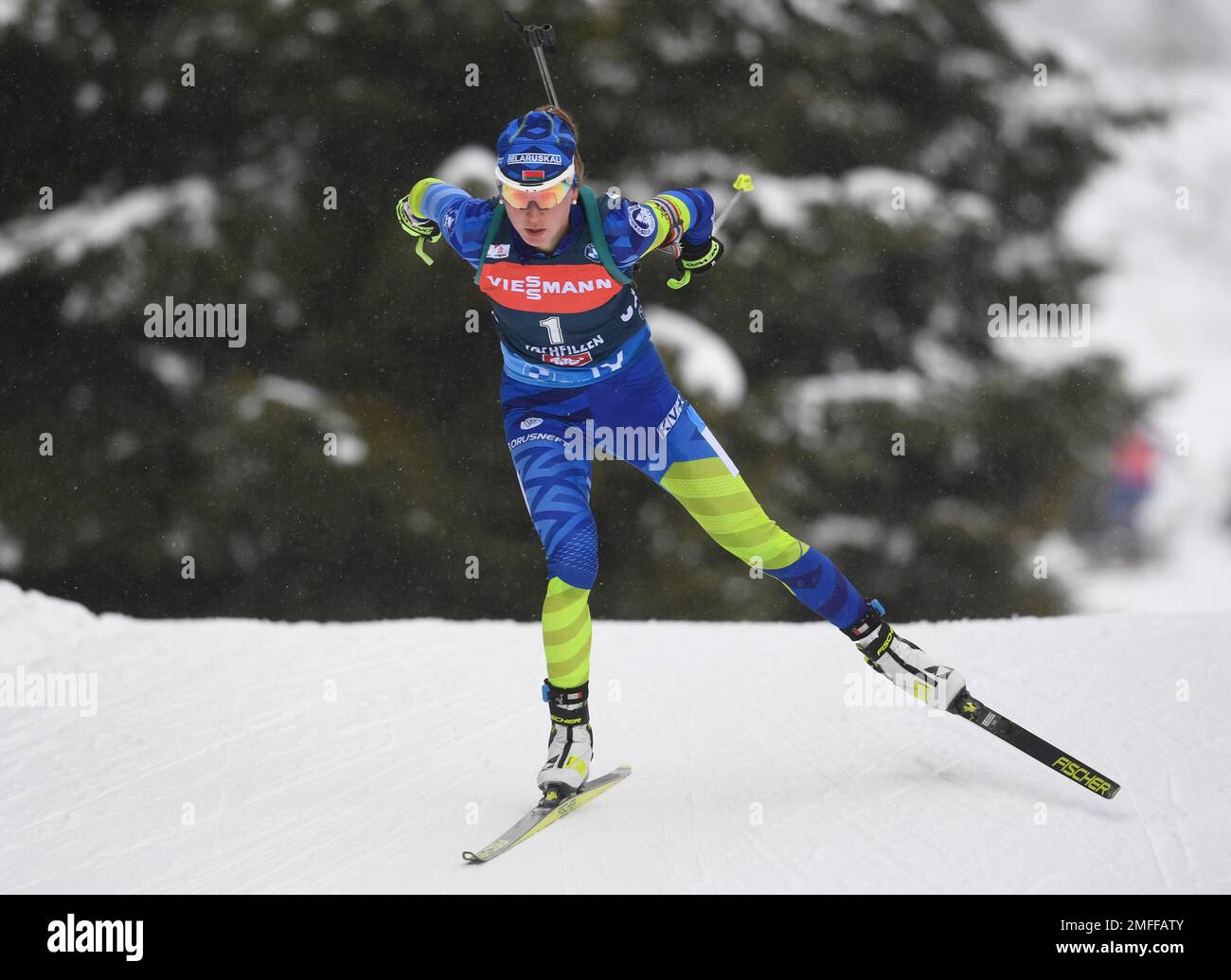 Dzinara Alimbekava of Belarus runs during the women's 10 km pursuit ...