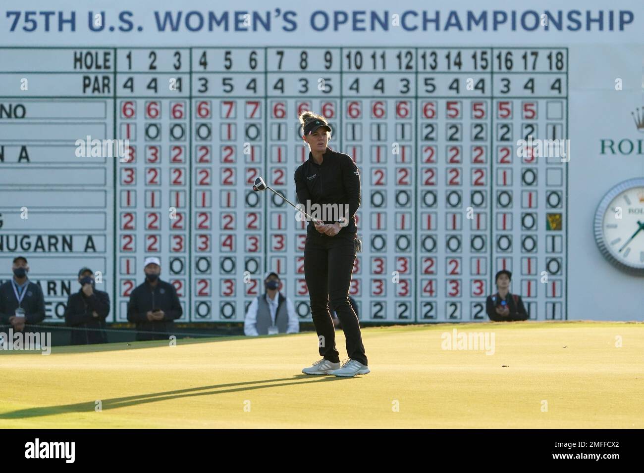 Amy Olson watches her shot miss for a birdie on the 18th green during ...