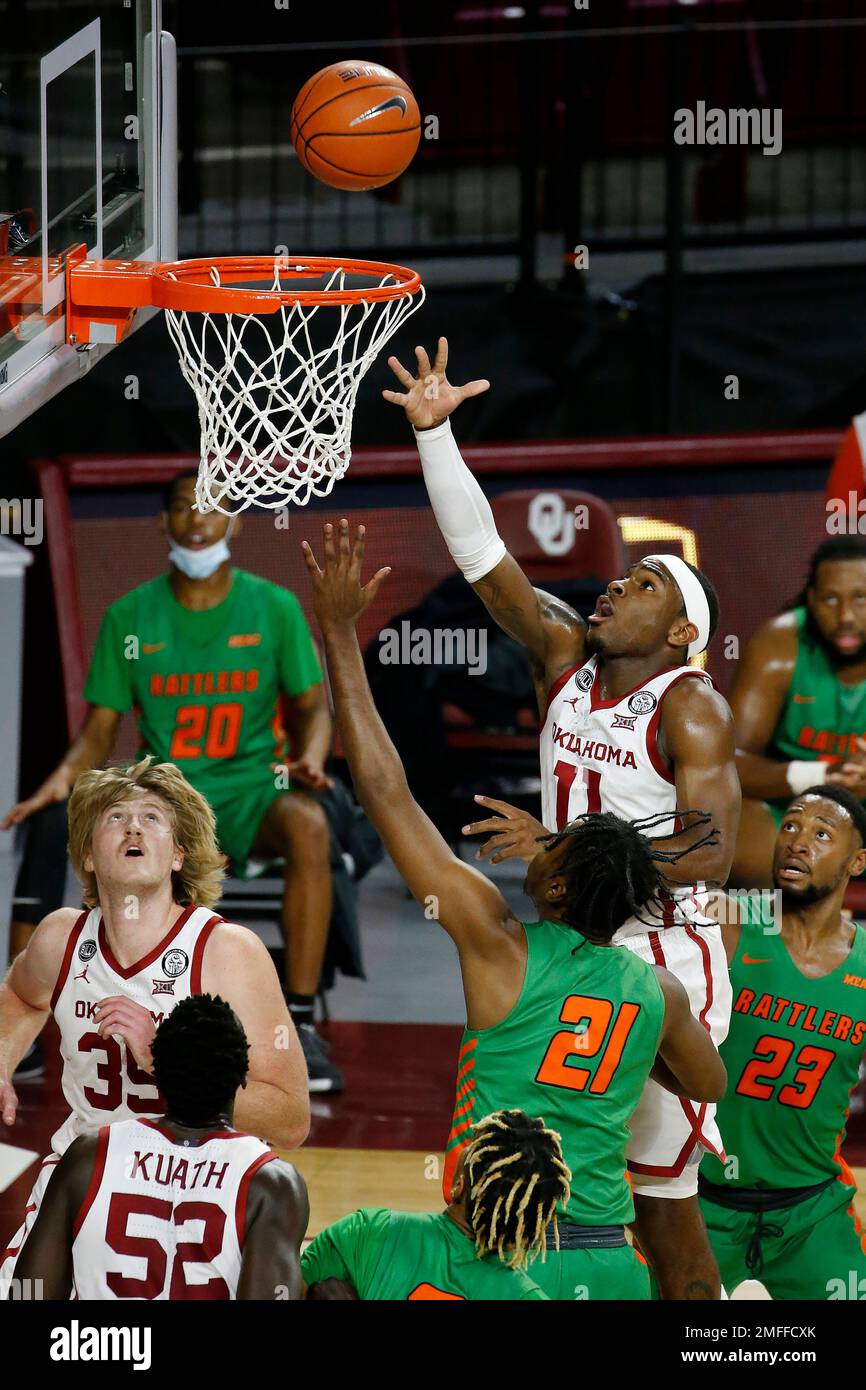 Oklahoma's De'Vion Harmon (11) takes a shot against Florida A&M's ...