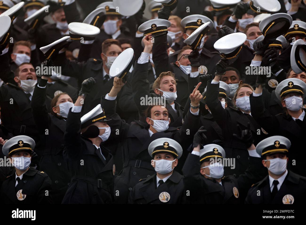 Navy Midshipmen cheer during the first half of an NCAA college football ...