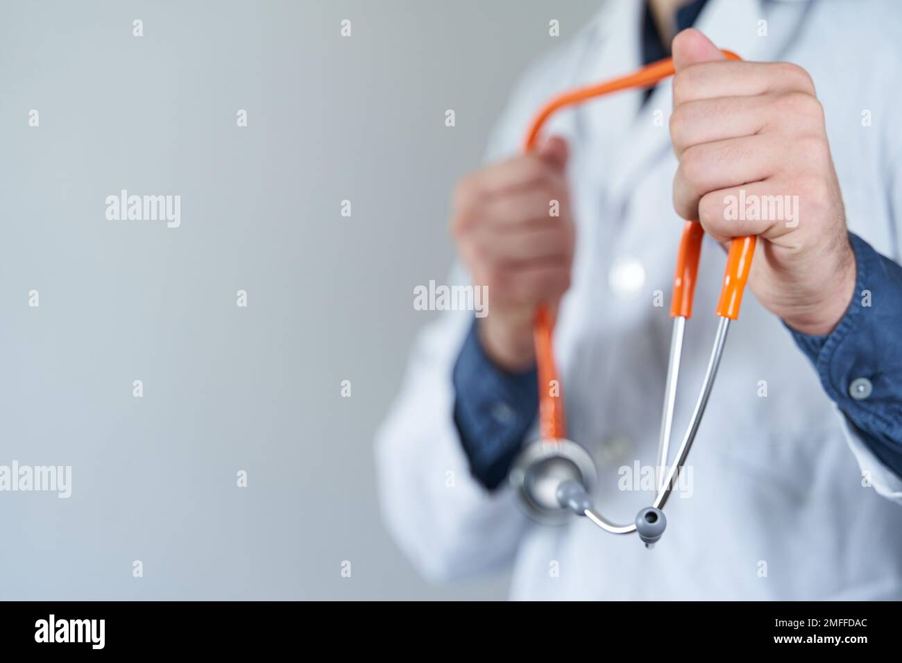 Fight for health care concept. Fist in fight position holding ...